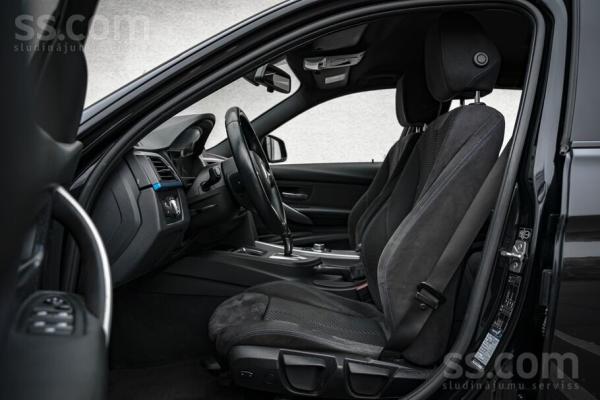 Black BMW 318 2013 in Riga, with an engine capacity of 2.00 L and mileage of 309 thousand km for 9350 €, photo 10 on AUTOMOTO.COM.LV