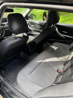Black BMW 318 2013 in Riga, with an engine capacity of 1.90 L and mileage of 227 thousand km for 7000 €, photo 12 on AUTOMOTO.COM.LV