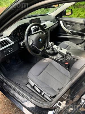 Black BMW 318 2013 in Riga, with an engine capacity of 1.90 L and mileage of 227 thousand km for 7000 €, photo 13 on AUTOMOTO.COM.LV