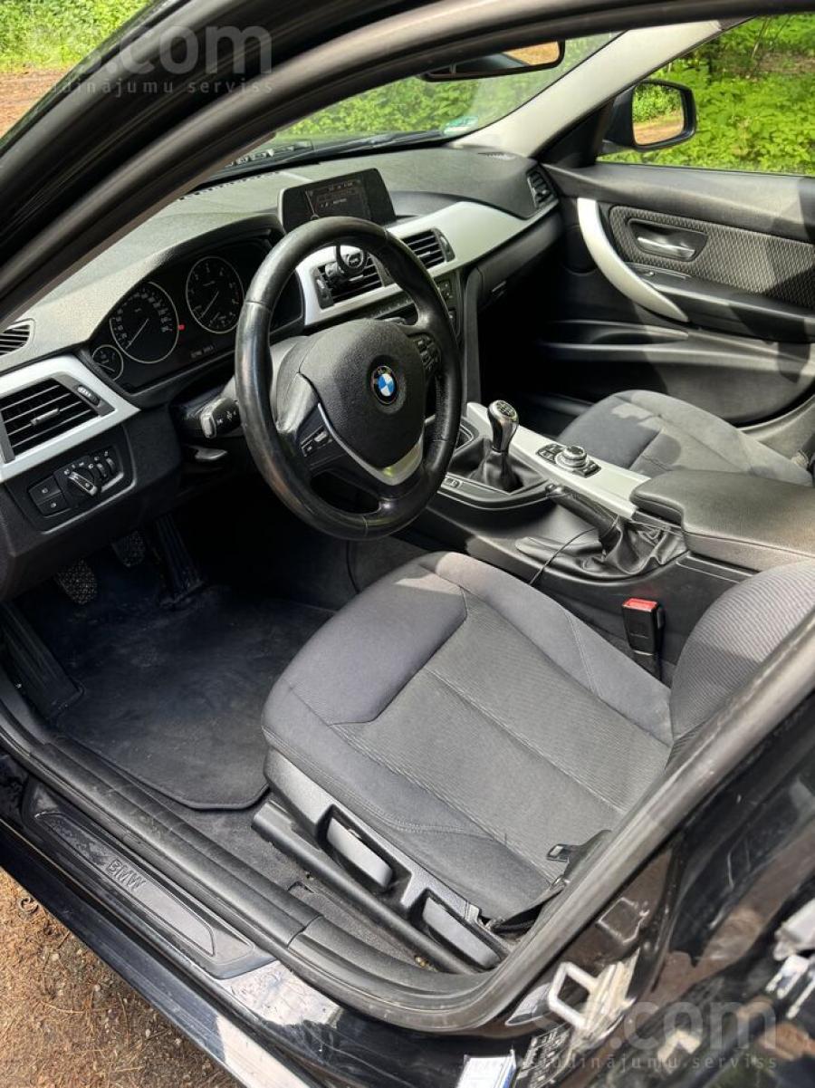 Black BMW 318 2013 in Riga, with an engine capacity of 1.90 L and mileage of 227 thousand km for 7000 €, photo 13 on AUTOMOTO.COM.LV