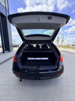 Black BMW 318 2013 in Vilnius, with an engine capacity of 2.00 L and mileage of 379 thousand km for 6900 €, photo 6 on AUTOMOTO.COM.LV