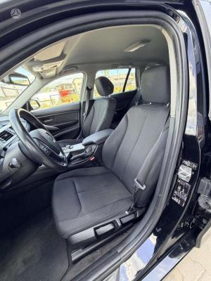 Black BMW 318 2013 in Vilnius, with an engine capacity of 2.00 L and mileage of 379 thousand km for 6900 €, photo 9 on AUTOMOTO.COM.LV
