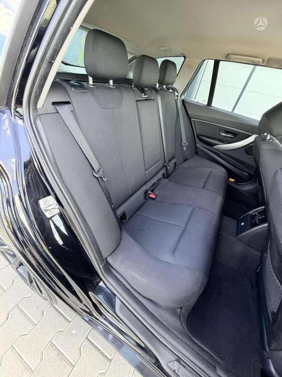 Black BMW 318 2013 in Vilnius, with an engine capacity of 2.00 L and mileage of 379 thousand km for 6900 €, photo 10 on AUTOMOTO.COM.LV