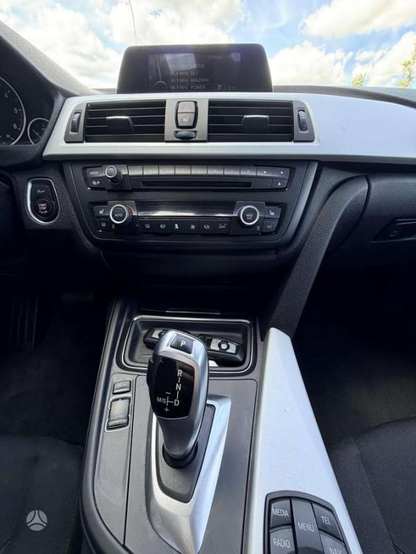 Black BMW 318 2013 in Vilnius, with an engine capacity of 2.00 L and mileage of 379 thousand km for 6900 €, photo 10 on AUTOMOTO.COM.LV