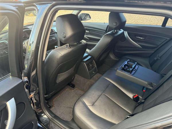 Black BMW 318 2013 in Skuodas, with an engine capacity of 2.00 L and mileage of 323 thousand km for 6700 €, photo 9 on AUTOMOTO.COM.LV