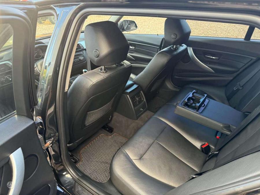 Black BMW 318 2013 in Skuodas, with an engine capacity of 2.00 L and mileage of 323 thousand km for 6700 €, photo 10 on AUTOMOTO.COM.LV
