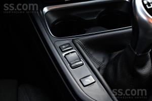 Black BMW 318 2013 in Tukums, with an engine capacity of 2.00 L and mileage of 273 thousand km for 7099 €, photo 8 on AUTOMOTO.COM.LV