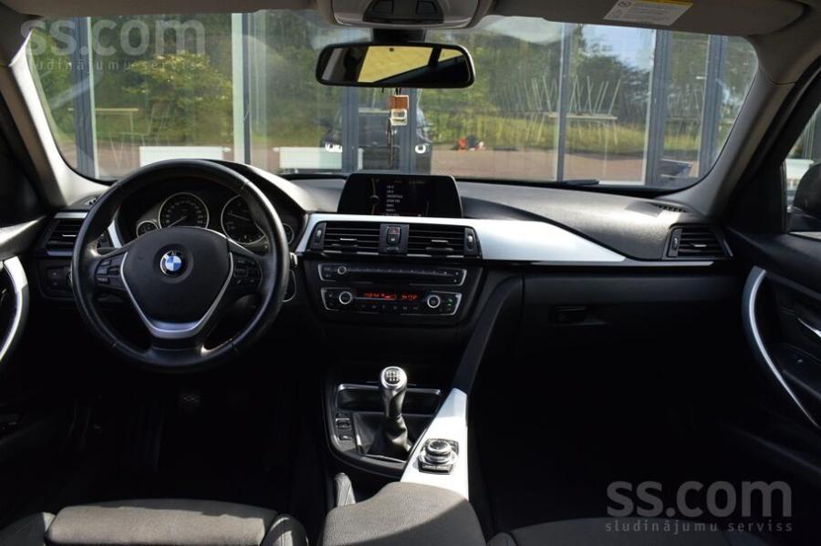 Black BMW 318 2013 in Tukums, with an engine capacity of 2.00 L and mileage of 273 thousand km for 7099 €, photo 11 on AUTOMOTO.COM.LV
