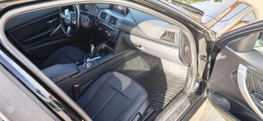 Black BMW 318 2013 in Kaunas, with an engine capacity of 2.00 L and mileage of 297 thousand km for 6900 €, photo 9 on AUTOMOTO.COM.LV