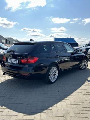 Black BMW 318 2013 in Kaunas, with an engine capacity of 2.00 L and mileage of 236 thousand km for 7000 €, photo 10 on AUTOMOTO.COM.LV