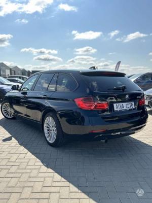 Black BMW 318 2013 in Kaunas, with an engine capacity of 2.00 L and mileage of 236 thousand km for 7000 €, photo 14 on AUTOMOTO.COM.LV