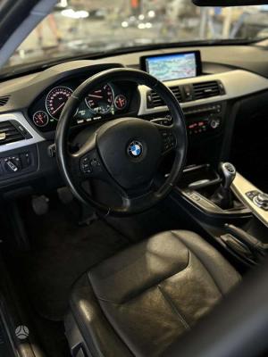 Black BMW 318 2013 in Kaunas, with an engine capacity of 2.00 L and mileage of 236 thousand km for 7000 €, photo 18 on AUTOMOTO.COM.LV