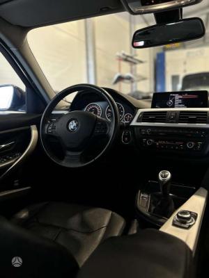 Black BMW 318 2013 in Kaunas, with an engine capacity of 2.00 L and mileage of 236 thousand km for 7000 €, photo 23 on AUTOMOTO.COM.LV