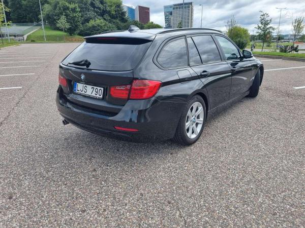Black BMW 318 2013 in Vilnius, with an engine capacity of 2.00 L and mileage of 303 thousand km for 7100 €, photo 2 on AUTOMOTO.COM.LV