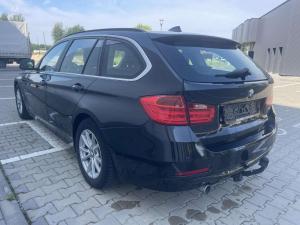 Black BMW 318 2013 in Kaunas, with an engine capacity of 2.00 L and mileage of 274 thousand km for 6250 €, photo 14 on AUTOMOTO.COM.LV