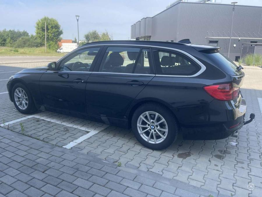 Black BMW 318 2013 in Kaunas, with an engine capacity of 2.00 L and mileage of 274 thousand km for 6250 €, photo 16 on AUTOMOTO.COM.LV