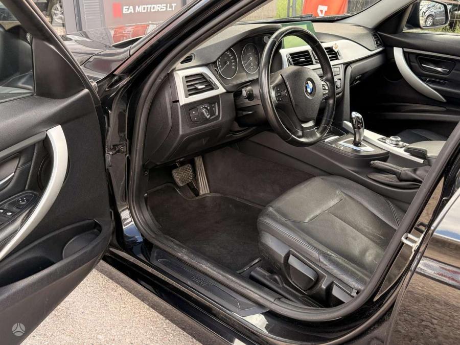 Black BMW 318 2013 in Vilnius, with an engine capacity of 2.00 L and mileage of 299 thousand km for 7100 €, photo 10 on AUTOMOTO.COM.LV