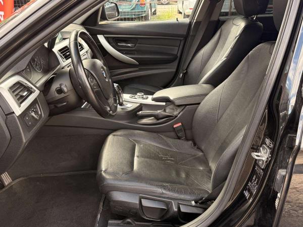 Black BMW 318 2013 in Vilnius, with an engine capacity of 2.00 L and mileage of 299 thousand km for 7100 €, photo 10 on AUTOMOTO.COM.LV