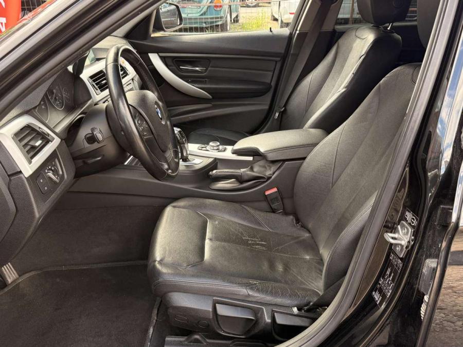 Black BMW 318 2013 in Vilnius, with an engine capacity of 2.00 L and mileage of 299 thousand km for 7100 €, photo 11 on AUTOMOTO.COM.LV