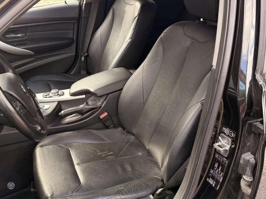 Black BMW 318 2013 in Vilnius, with an engine capacity of 2.00 L and mileage of 299 thousand km for 7100 €, photo 12 on AUTOMOTO.COM.LV
