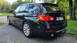 Black BMW 318 2013 in Riga, with an engine capacity of 2.00 L and mileage of 280 thousand km for 9497 €, photo 5 on AUTOMOTO.COM.LV