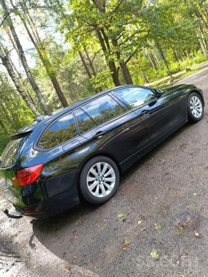 Black BMW 318 2013 in Riga, with an engine capacity of 2.00 L and mileage of 280 thousand km for 9497 €, photo 8 on AUTOMOTO.COM.LV