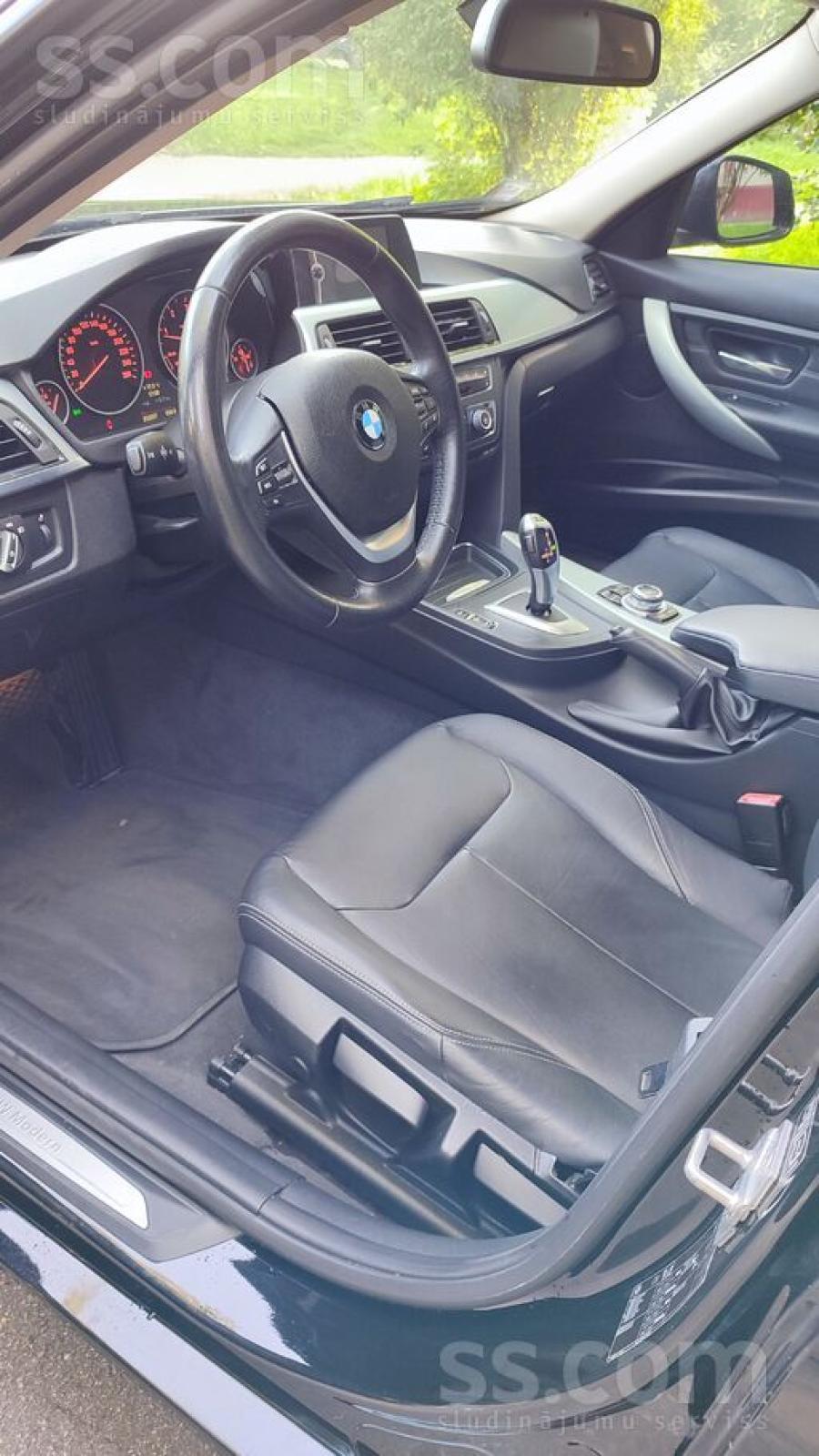 Black BMW 318 2013 in Riga, with an engine capacity of 2.00 L and mileage of 280 thousand km for 9497 €, photo 12 on AUTOMOTO.COM.LV