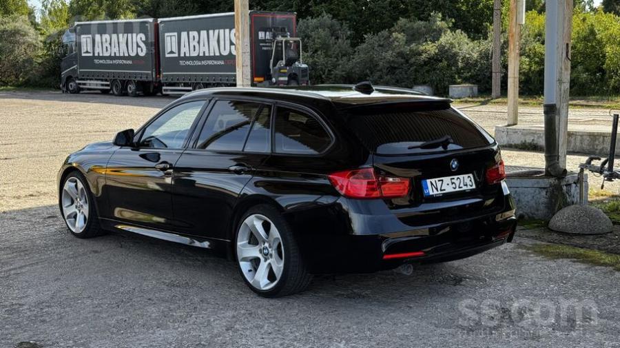Black BMW 318 2013 in Liepaja, with an engine capacity of 2.00 L and mileage of 302 thousand km for 8490 €, photo 3 on AUTOMOTO.COM.LV
