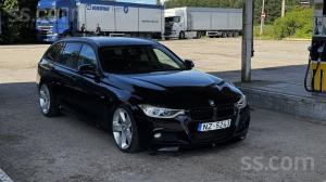 Black BMW 318 2013 in Liepaja, with an engine capacity of 2.00 L and mileage of 302 thousand km for 8490 €, photo 4 on AUTOMOTO.COM.LV
