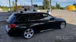 Black BMW 318 2013 in Liepaja, with an engine capacity of 2.00 L and mileage of 302 thousand km for 8490 €, photo 5 on AUTOMOTO.COM.LV