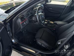Black BMW 318 2013 in Liepaja, with an engine capacity of 2.00 L and mileage of 302 thousand km for 8490 €, photo 6 on AUTOMOTO.COM.LV