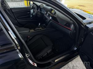 Black BMW 318 2013 in Liepaja, with an engine capacity of 2.00 L and mileage of 302 thousand km for 8490 €, photo 8 on AUTOMOTO.COM.LV