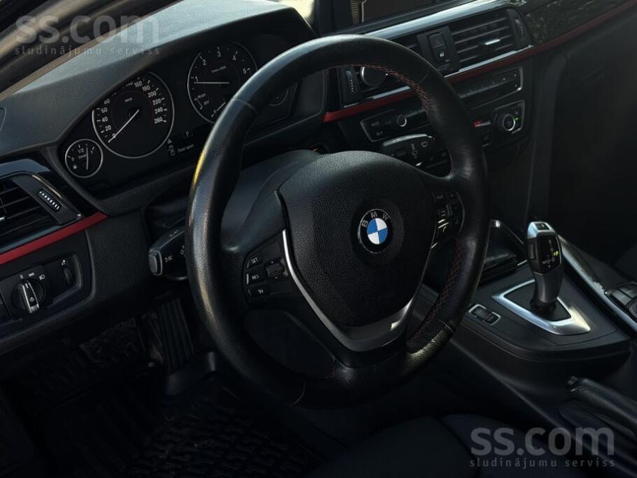 Black BMW 318 2013 in Liepaja, with an engine capacity of 2.00 L and mileage of 302 thousand km for 8490 €, photo 9 on AUTOMOTO.COM.LV