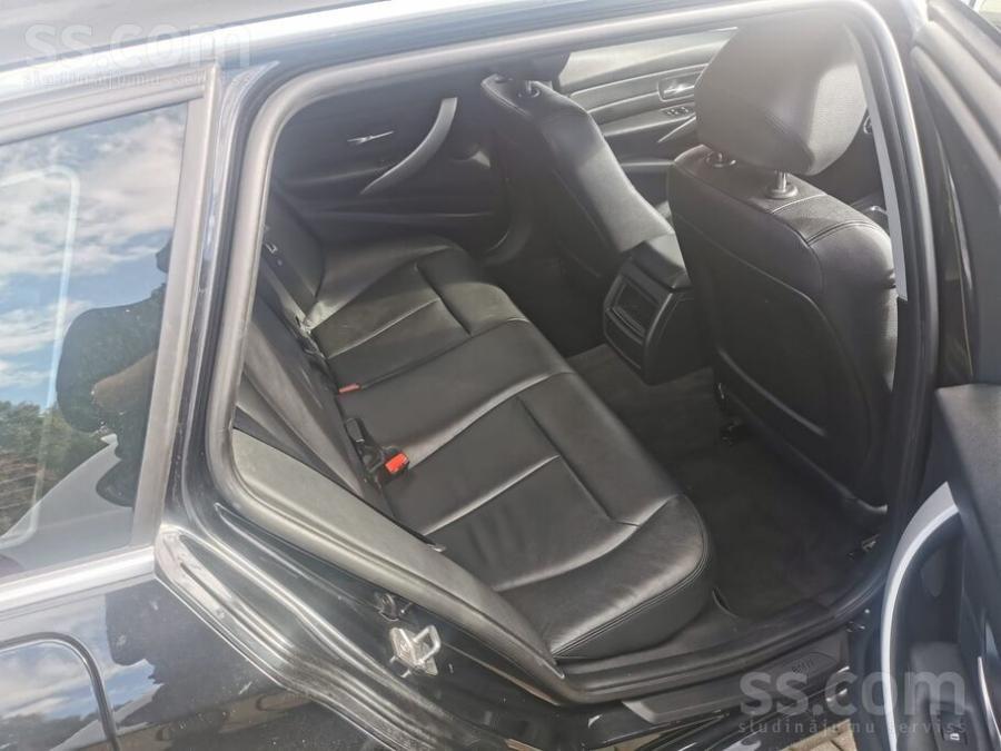 Black BMW 318 2013 in Riga, with an engine capacity of 2.00 L and mileage of 382 thousand km for 5600 €, photo 7 on AUTOMOTO.COM.LV