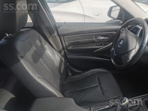 Black BMW 318 2013 in Riga, with an engine capacity of 2.00 L and mileage of 382 thousand km for 5600 €, photo 8 on AUTOMOTO.COM.LV