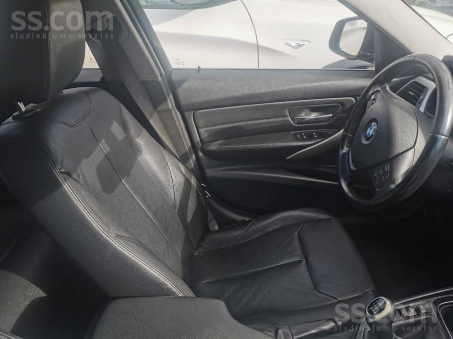 Black BMW 318 2013 in Riga, with an engine capacity of 2.00 L and mileage of 382 thousand km for 5600 €, photo 8 on AUTOMOTO.COM.LV