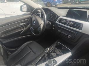 Black BMW 318 2013 in Riga, with an engine capacity of 2.00 L and mileage of 382 thousand km for 5600 €, photo 9 on AUTOMOTO.COM.LV