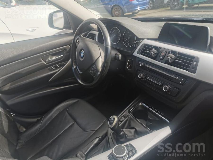 Black BMW 318 2013 in Riga, with an engine capacity of 2.00 L and mileage of 382 thousand km for 5600 €, photo 9 on AUTOMOTO.COM.LV