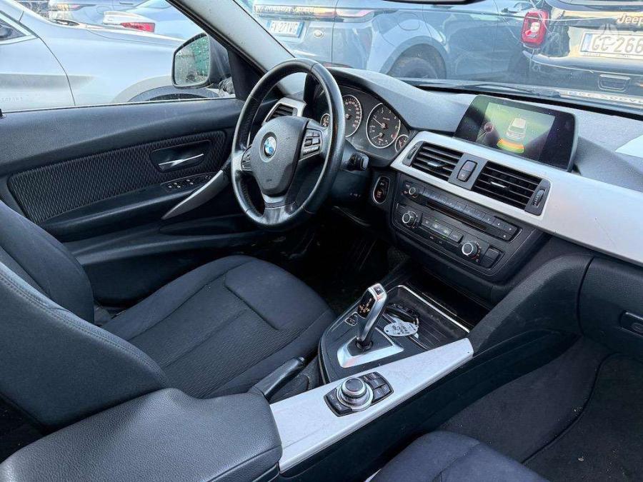 Black BMW 318 2014 in Siauliai, with an engine capacity of 2.00 L and mileage of 300 thousand km for 4700 €, photo 7 on AUTOMOTO.COM.LV