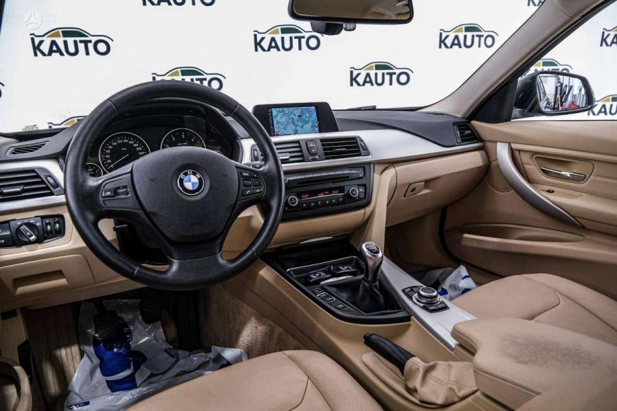 Black BMW 318 2014 in Kaunas, with an engine capacity of 2.00 L and mileage of 286 thousand km for 7490 €, photo 8 on AUTOMOTO.COM.LV