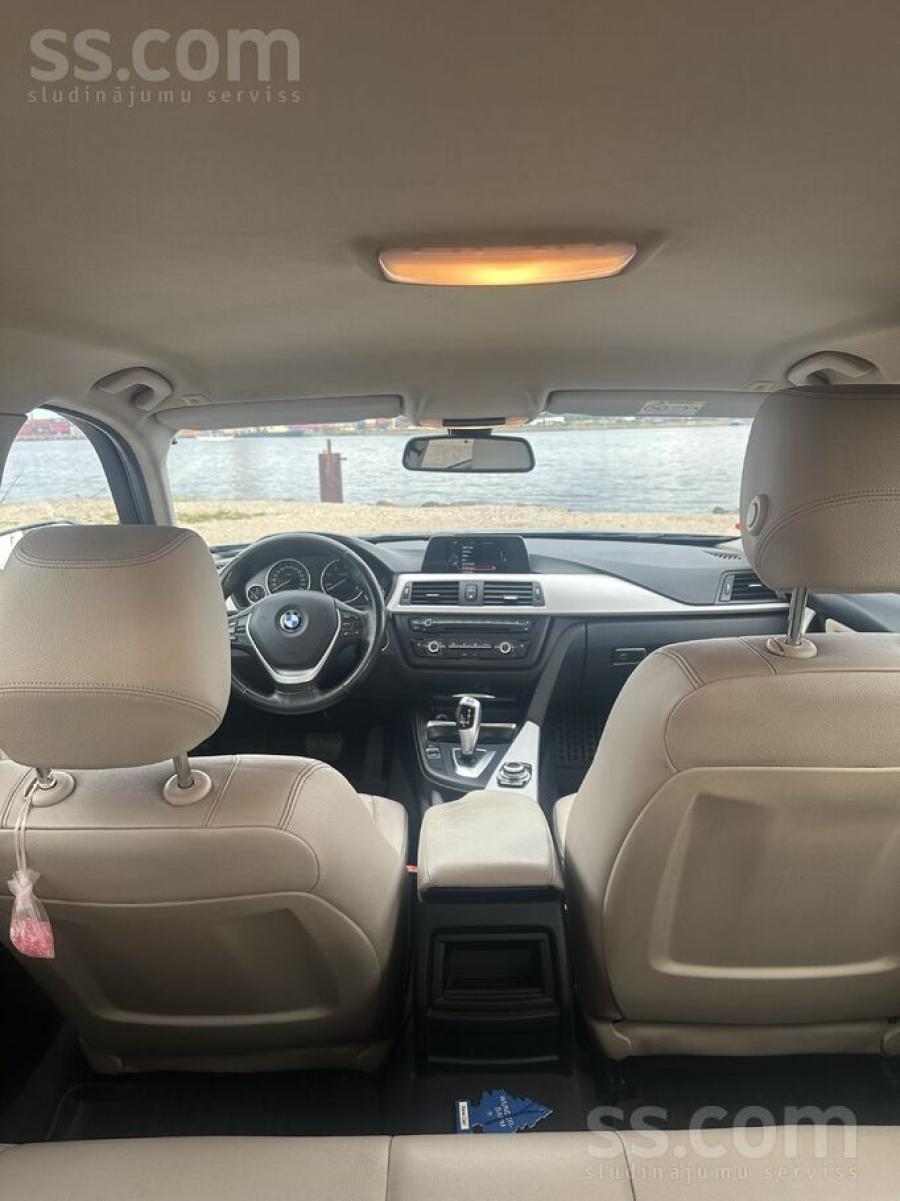 Black BMW 318 2014 in Riga, with an engine capacity of 2.00 L and mileage of 365 thousand km for 9600 €, photo 9 on AUTOMOTO.COM.LV
