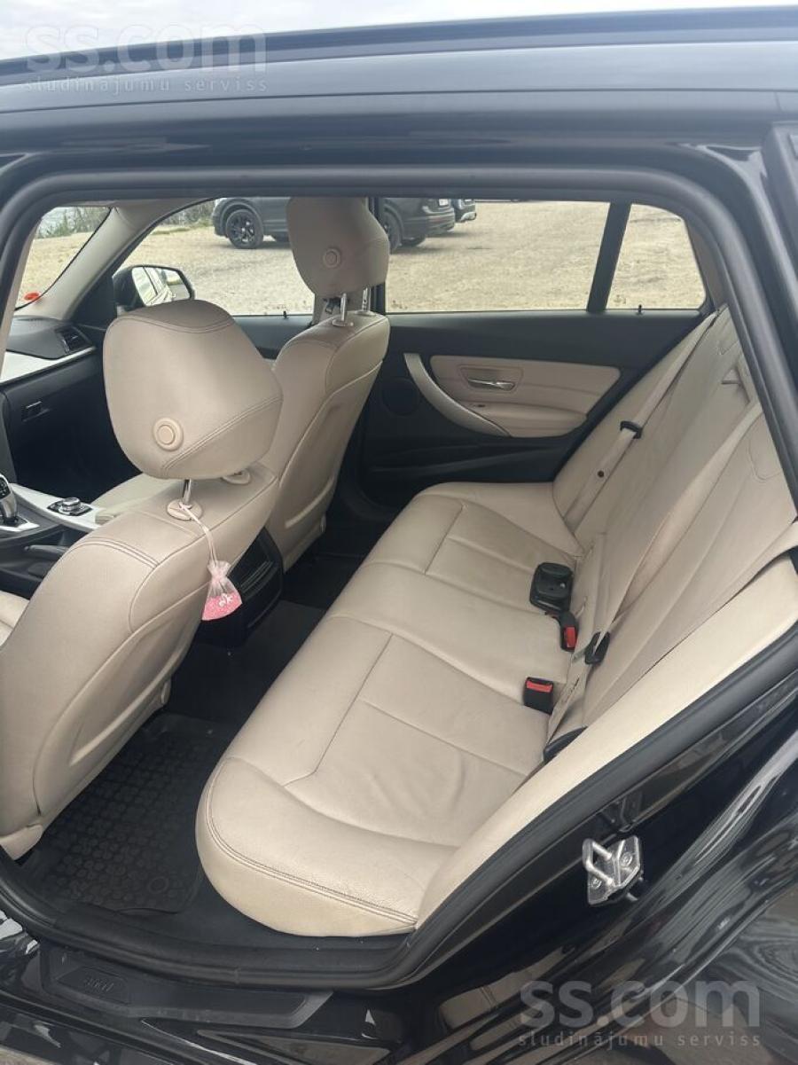 Black BMW 318 2014 in Riga, with an engine capacity of 2.00 L and mileage of 365 thousand km for 9600 €, photo 14 on AUTOMOTO.COM.LV