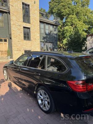 Black BMW 318 2014 in Riga, with an engine capacity of 2.00 L and mileage of 266 thousand km for 8995 €, photo 6 on AUTOMOTO.COM.LV