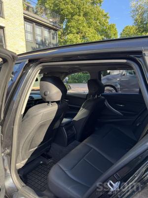 Black BMW 318 2014 in Riga, with an engine capacity of 2.00 L and mileage of 266 thousand km for 8995 €, photo 9 on AUTOMOTO.COM.LV
