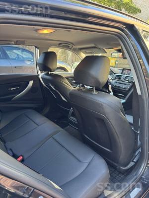 Black BMW 318 2014 in Riga, with an engine capacity of 2.00 L and mileage of 266 thousand km for 8995 €, photo 12 on AUTOMOTO.COM.LV