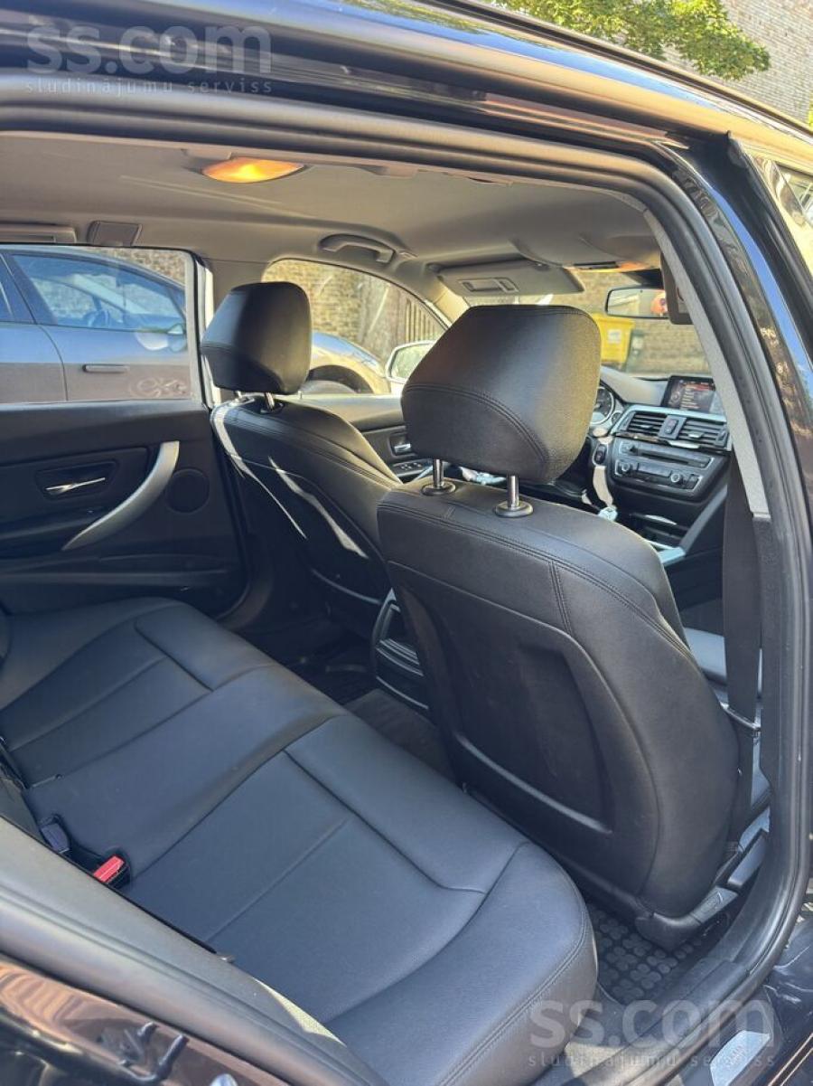 Black BMW 318 2014 in Riga, with an engine capacity of 2.00 L and mileage of 266 thousand km for 8995 €, photo 12 on AUTOMOTO.COM.LV