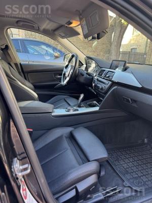 Black BMW 318 2014 in Riga, with an engine capacity of 2.00 L and mileage of 266 thousand km for 8995 €, photo 13 on AUTOMOTO.COM.LV