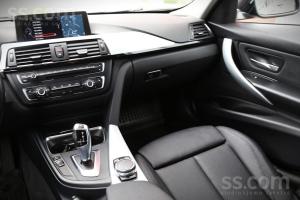 Black BMW 318 2014 in Riga, with an engine capacity of 2.00 L and mileage of 266 thousand km for 7495 €, photo 10 on AUTOMOTO.COM.LV