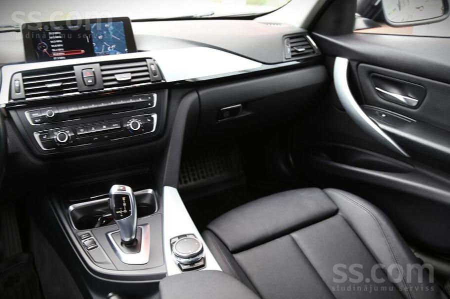 Black BMW 318 2014 in Riga, with an engine capacity of 2.00 L and mileage of 266 thousand km for 7495 €, photo 10 on AUTOMOTO.COM.LV