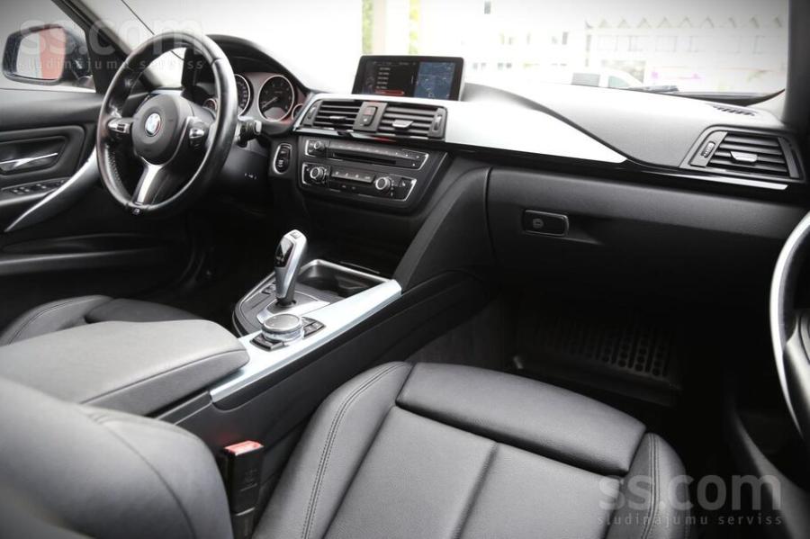 Black BMW 318 2014 in Riga, with an engine capacity of 2.00 L and mileage of 266 thousand km for 7495 €, photo 11 on AUTOMOTO.COM.LV